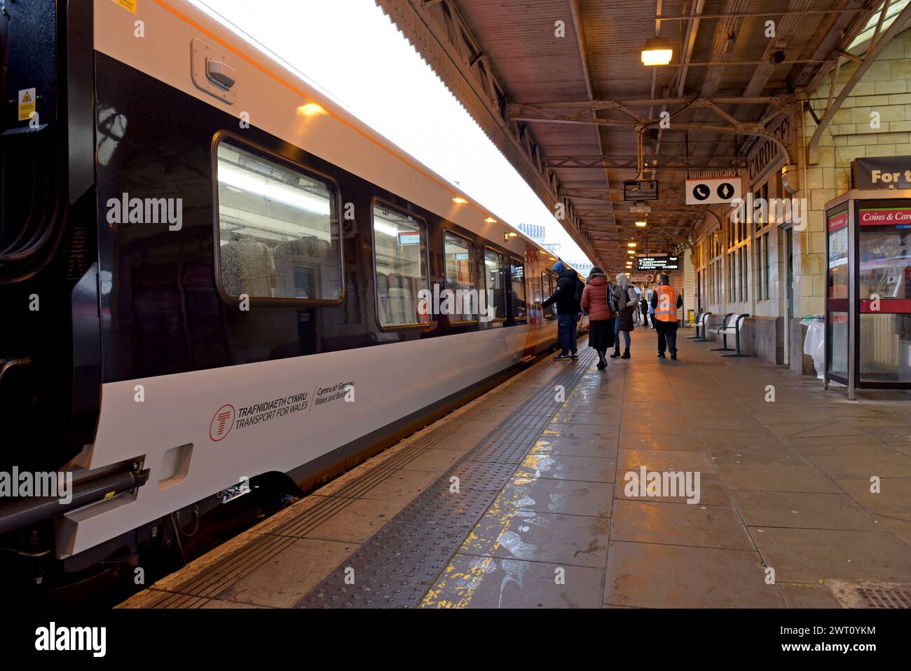 Passengers getting on a new Transport For Wales Class 231 Stadler Flirt ...