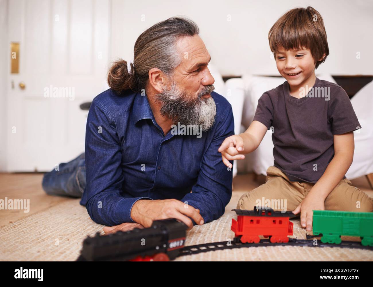 Happy child playing train father hi-res stock photography and images ...