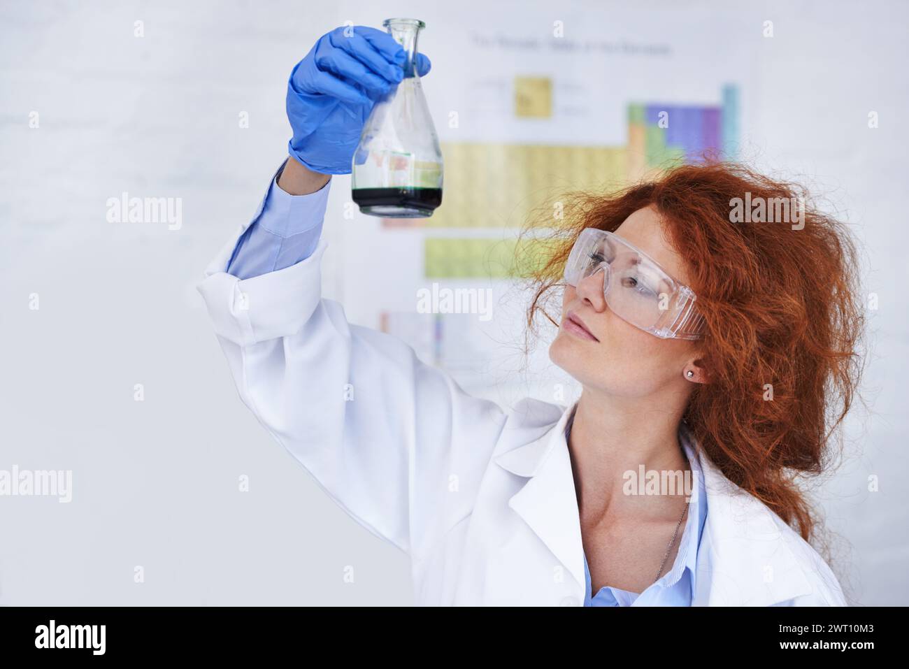Science, liquid and woman with container for research in chemistry ...
