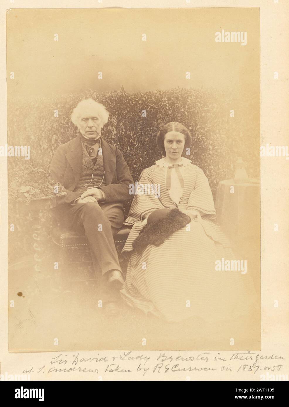Sir David and Lady Brewster in their garden at St. Andrews. Robert Ewing Curwen, photographer ...