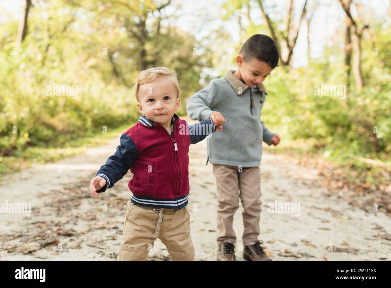 Brothers walking together hi-res stock photography and images - Alamy