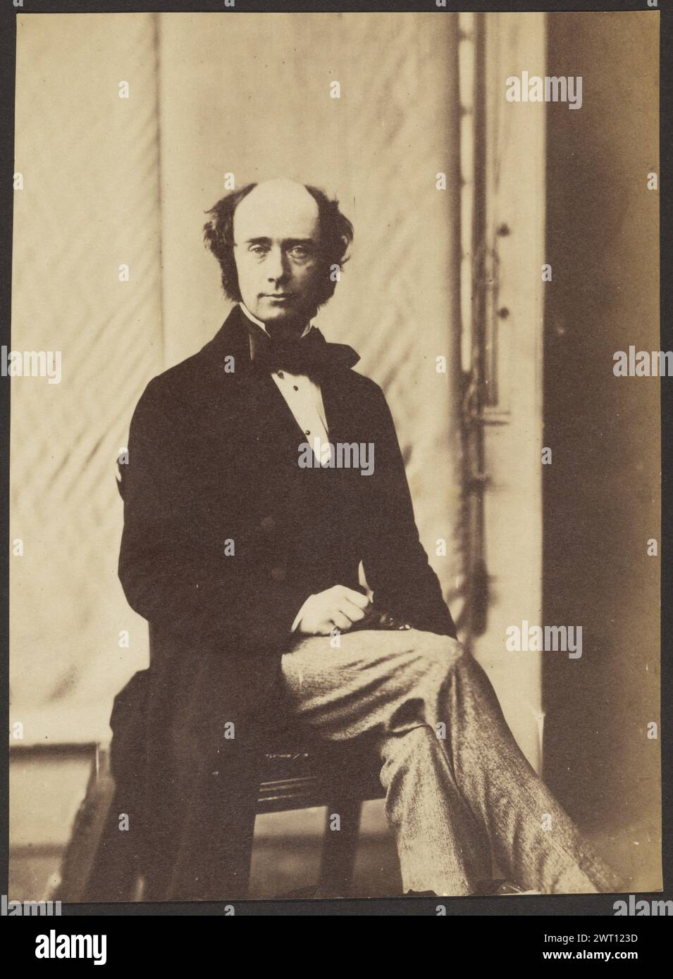 Seated figure in formal attire hi-res stock photography and images - Alamy