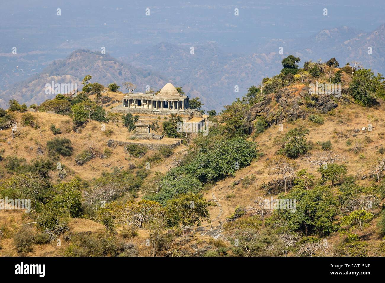 isolated temple situated in the middle of forests at morning from flat ...