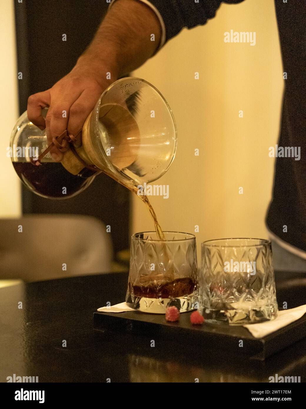 Black coffee pouring cup slow hi-res stock photography and images - Alamy