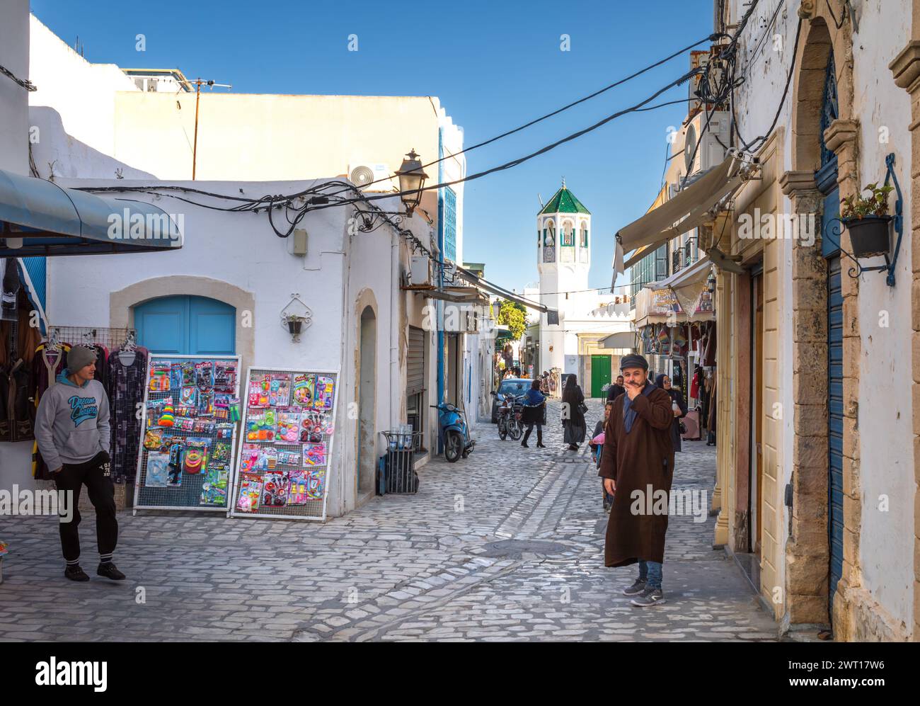 Shops and people and the 18th century Hadj Mustapha Mosque in the ...