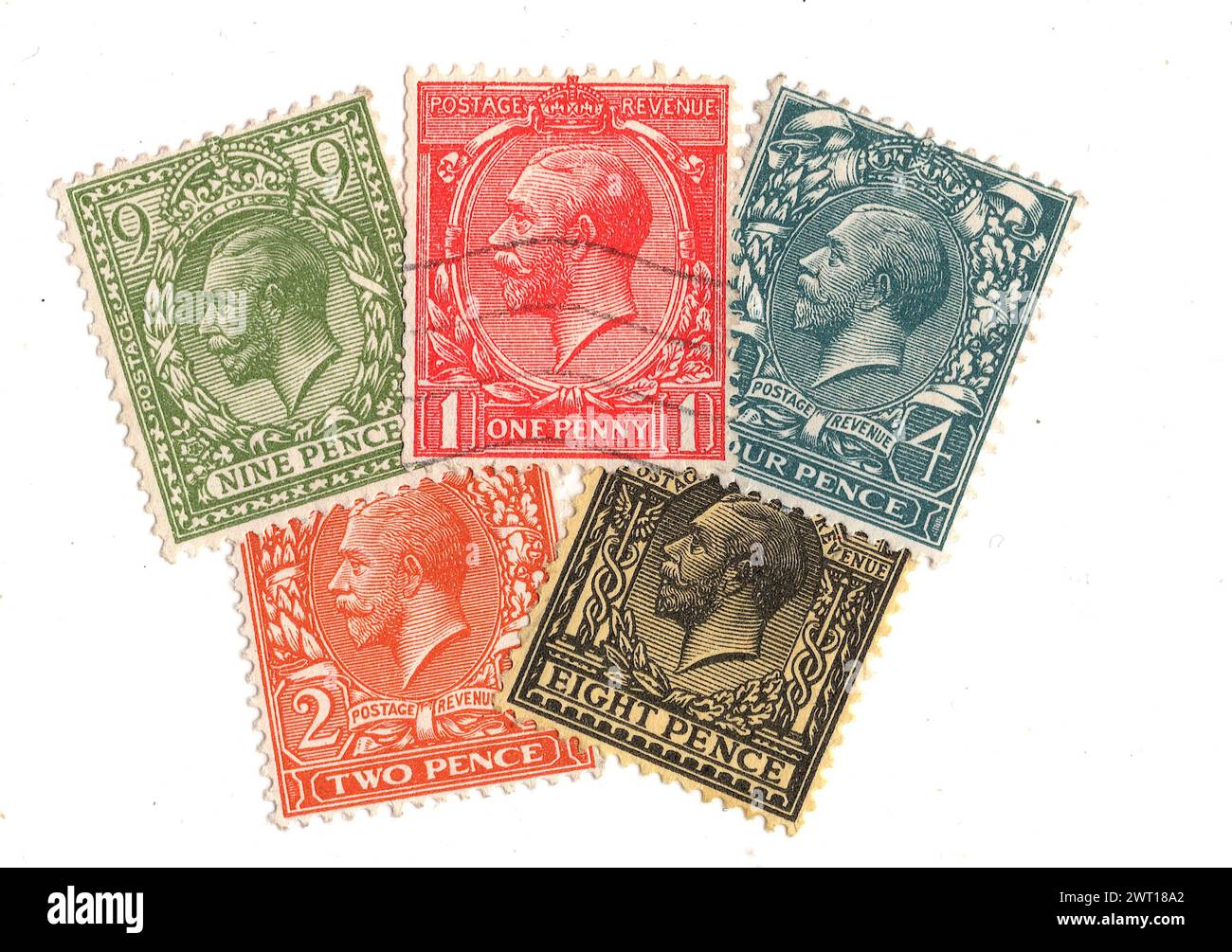 Vintage King George V postage stamps from Great Britain isolated on a ...