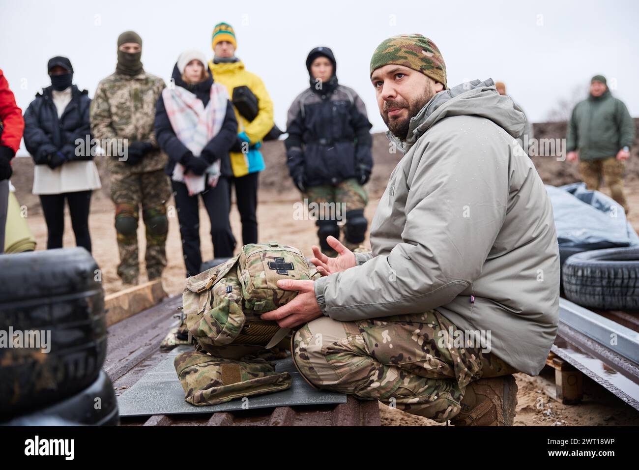 Ukrainian drill sergeant teaching the recruits to use medical kit and ...