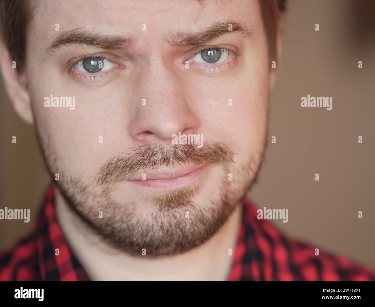 Sad young man portrait hi-res stock photography and images - Alamy