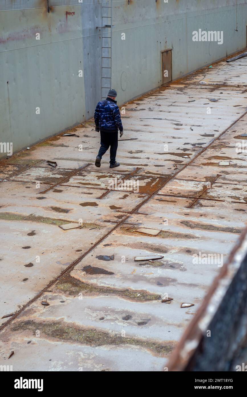Old river vessels rust on dock repair shop Stock Photo - Alamy
