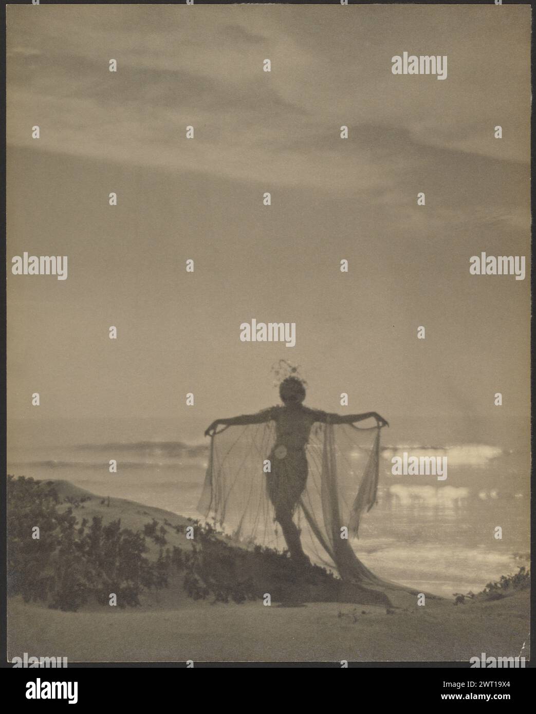 Back View of a Dancer Wearing a Sheer Costume at the Beach. Arthur F ...