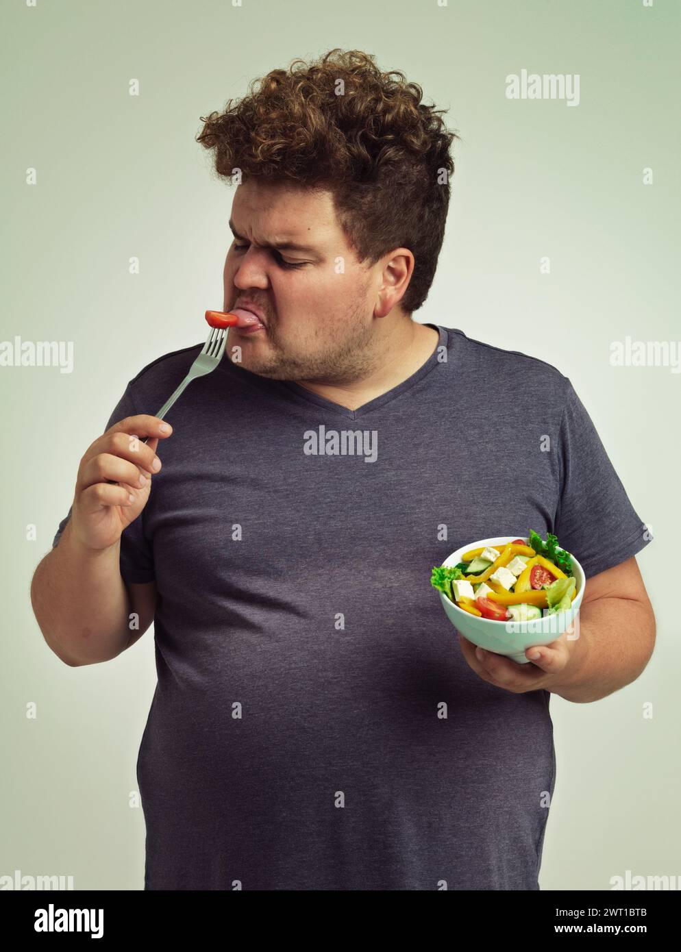 Man eating salad disgust hi-res stock photography and images - Alamy