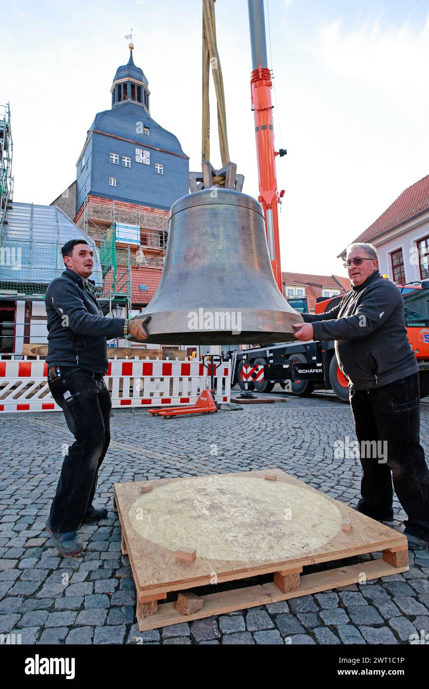 Harzgerode, Germany. 15th Mar, 2024. One of three new bells is hoisted ...