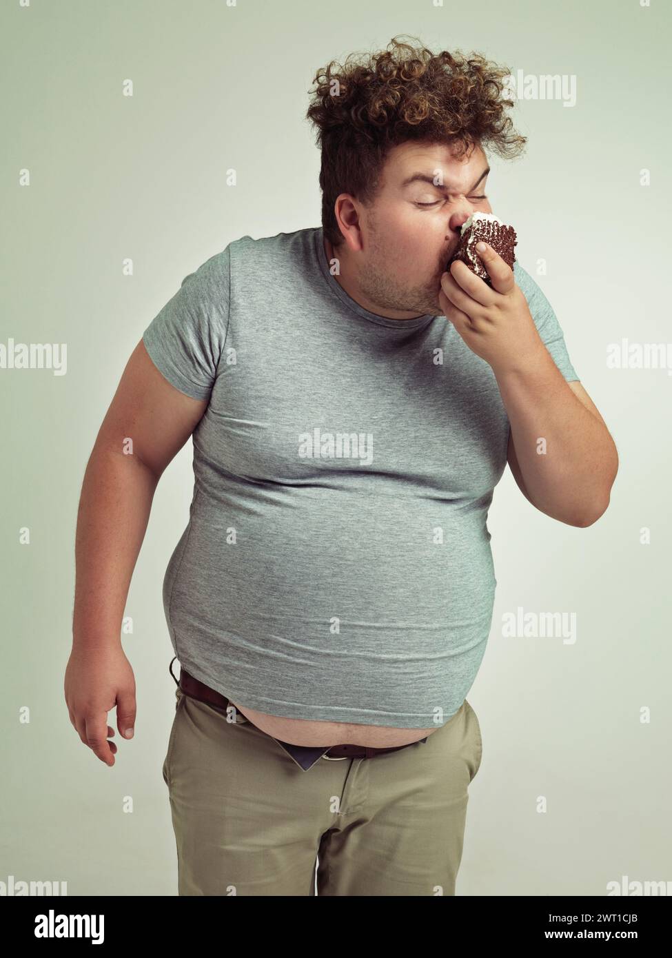 Eating greedy man hi-res stock photography and images - Alamy