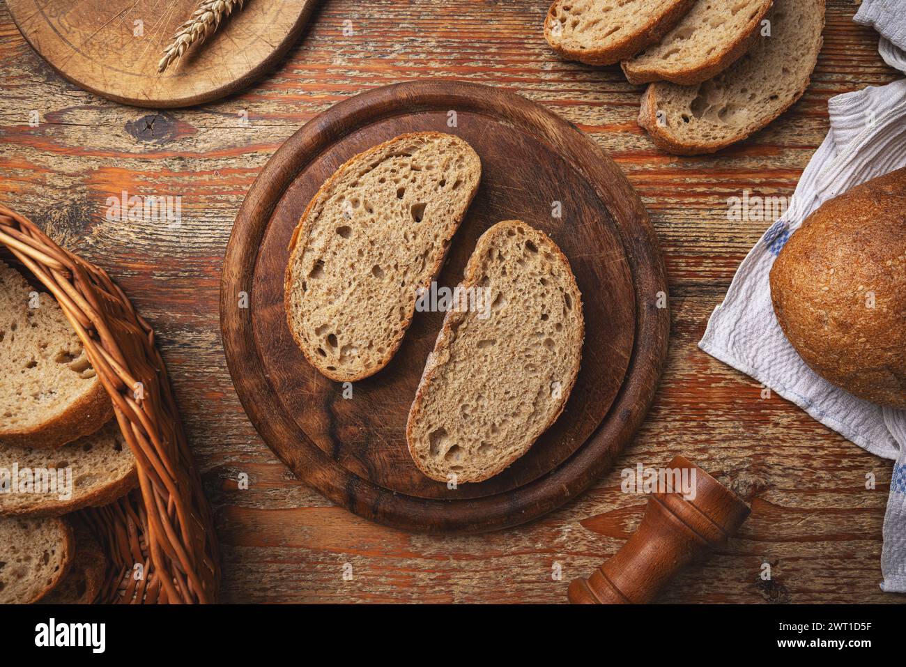 Traditional wheat freshly rustic baked bread slices Stock Photo - Alamy