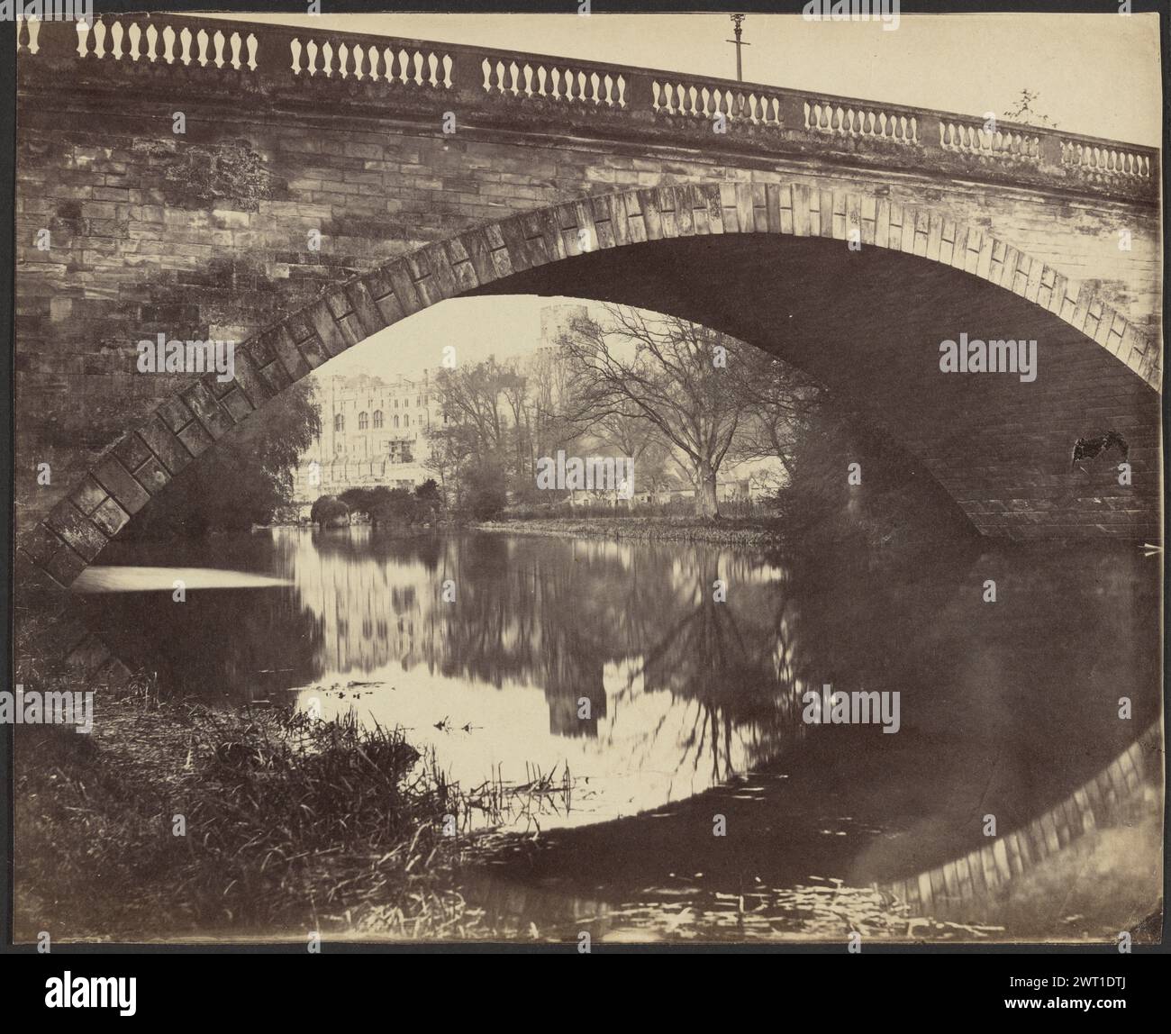 With the stone arch bridge visible in the background hi-res stock ...