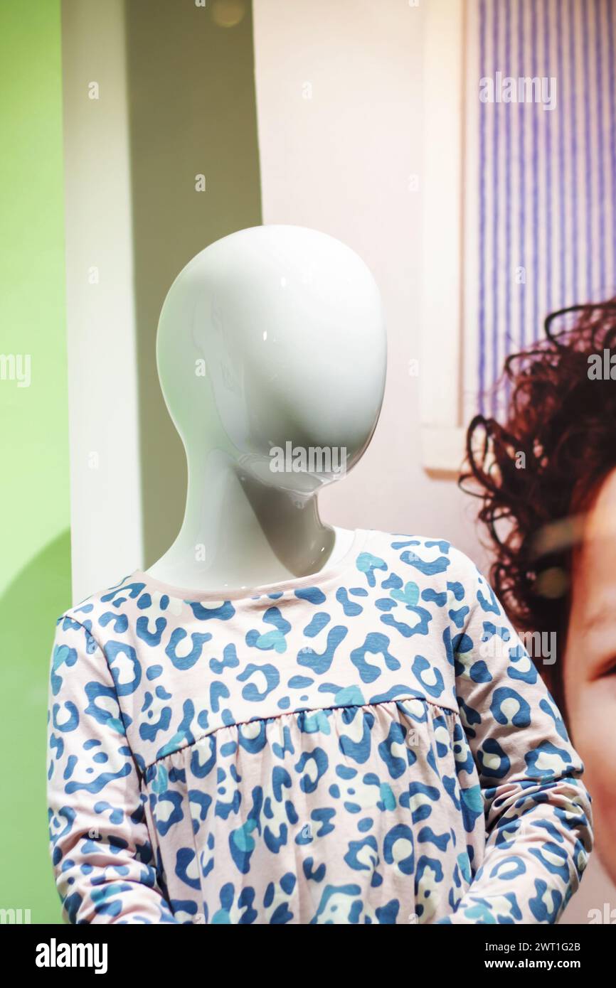 Baby mannequin in bright clothes in store close up Stock Photo - Alamy