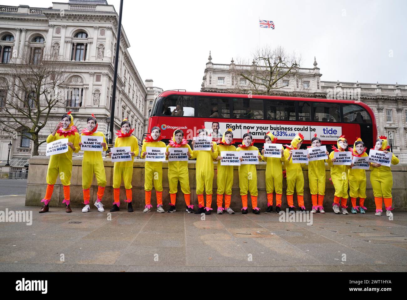 Demonstrators dressed as chickens protest opposite downing street in ...