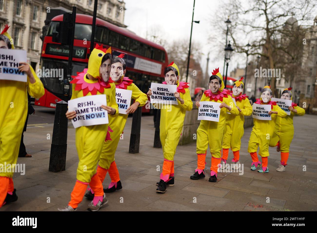 Demonstrators dressed as chickens protest opposite downing street in ...