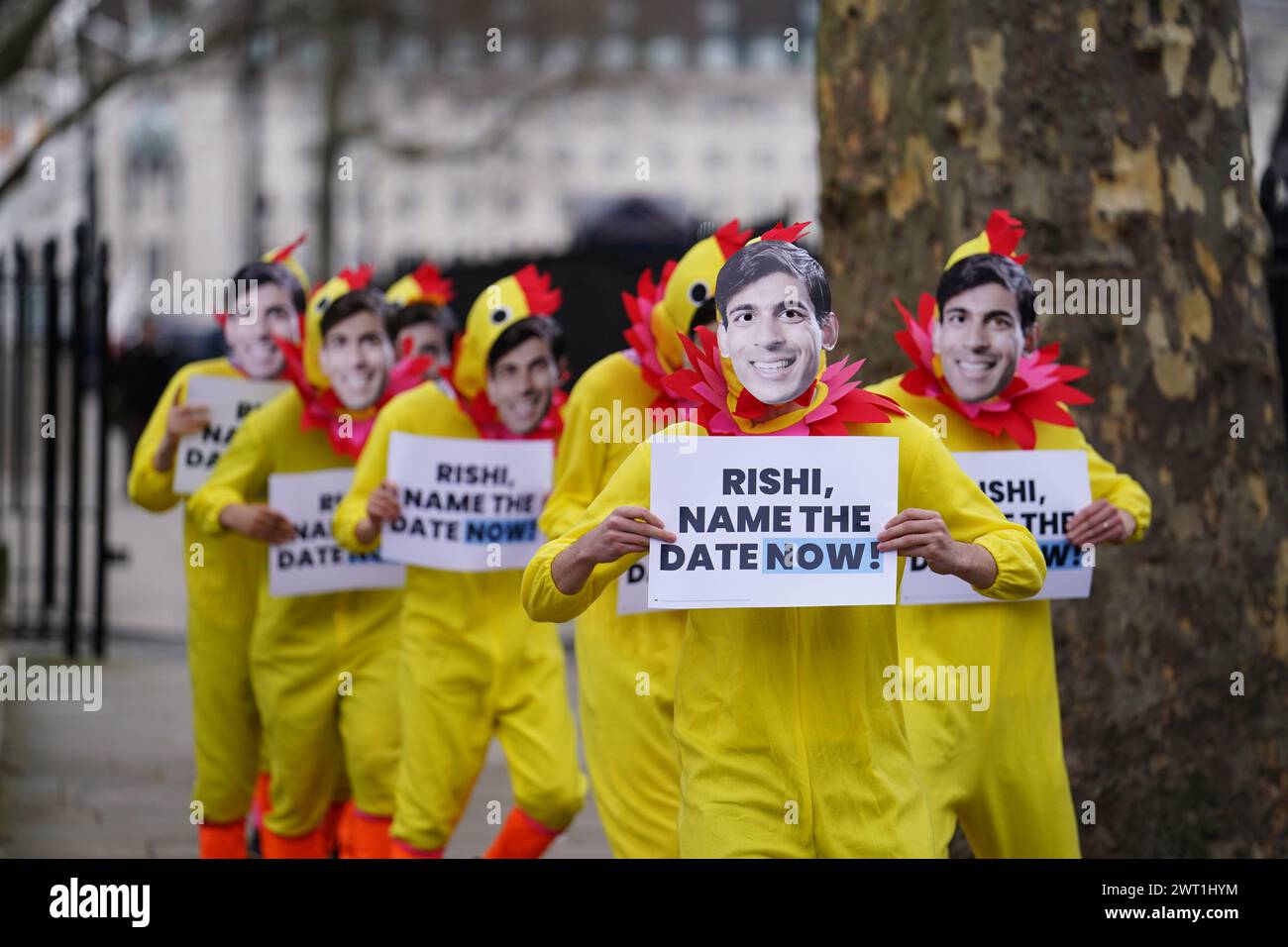 Demonstrators dressed as chickens protest opposite downing street in ...