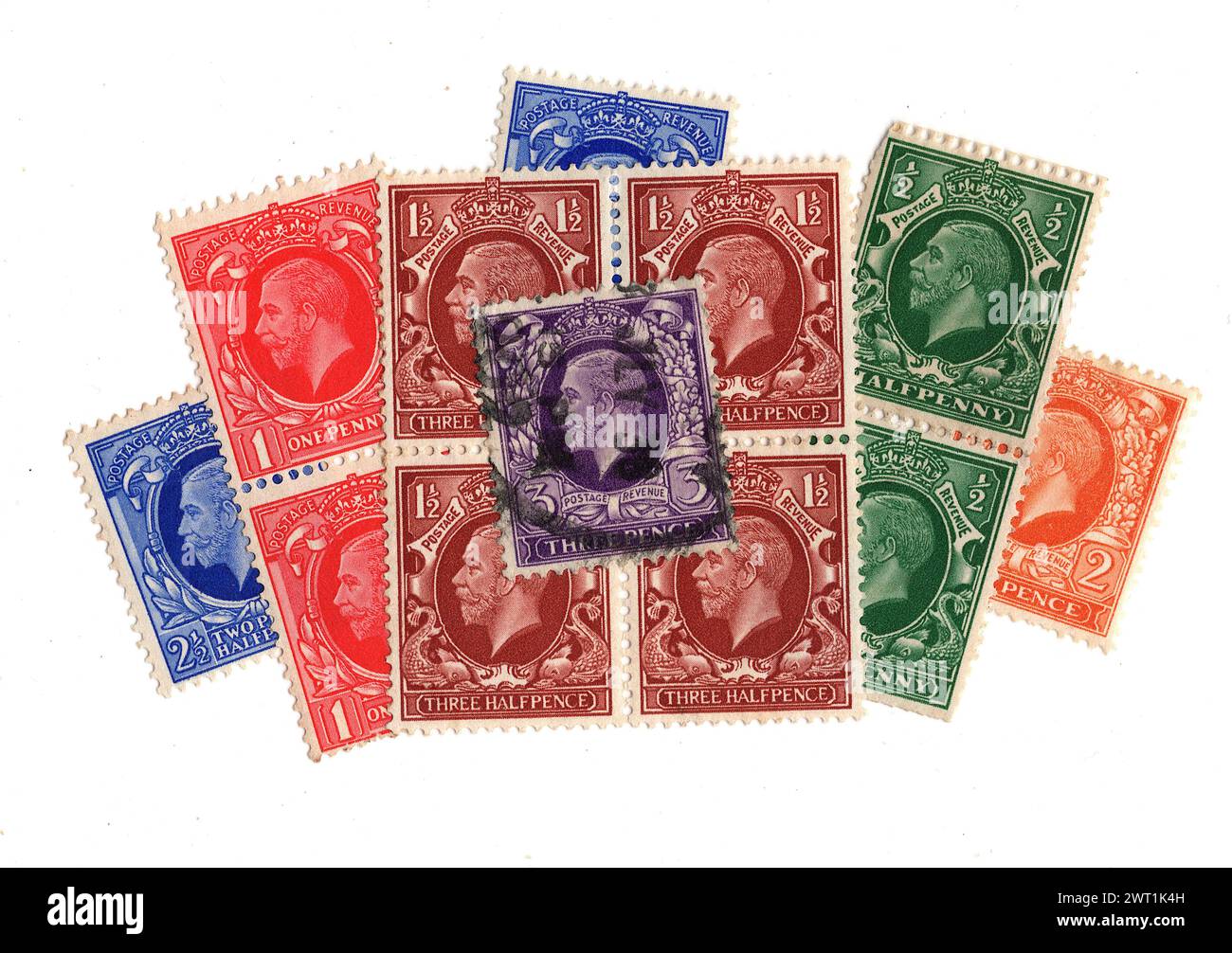 Vintage King George V postage stamps from Great Britain isolated on a ...