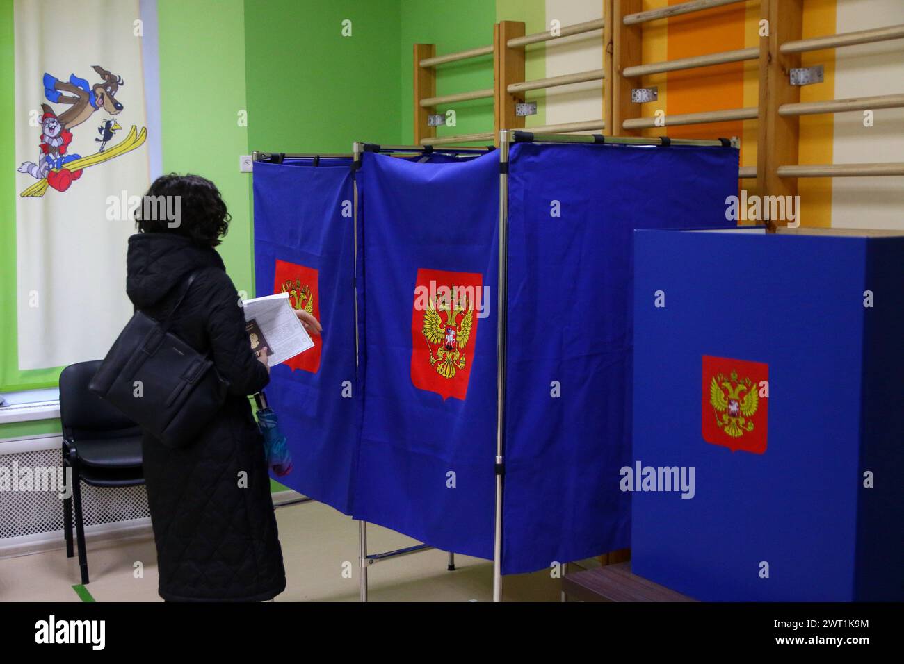 Saint Petersburg, Russia. 15th Mar, 2024. A woman seen entering a ...