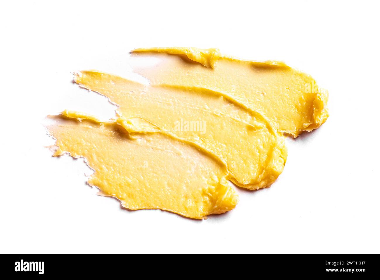 Yellow cosmetic cream swatch smear smudge isolated on white background ...
