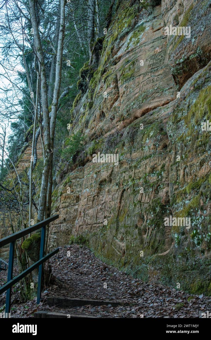 Wandering among the red cliffs of Cesis, visitors are transported to a ...