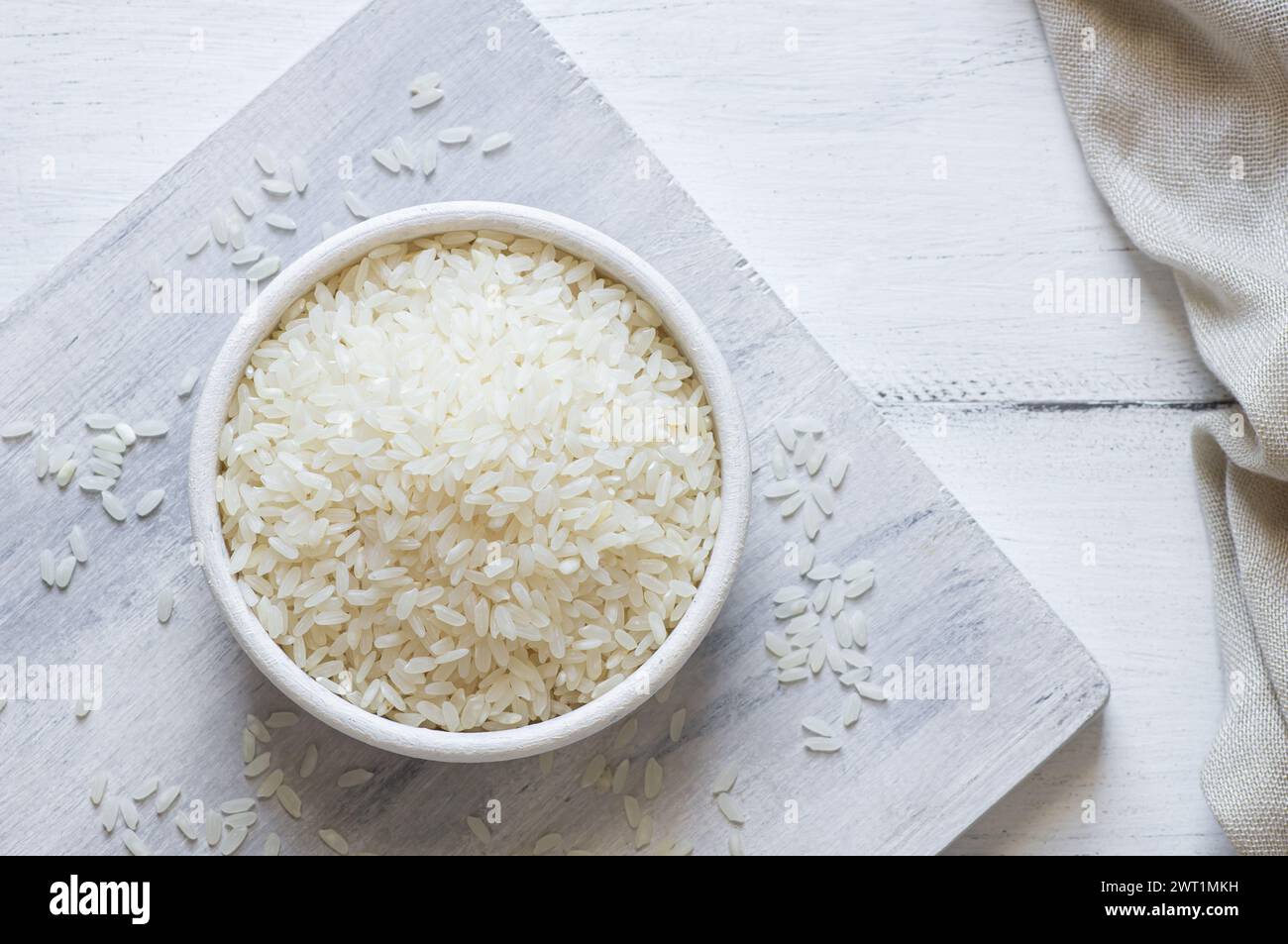 turkish raw white rice grains in bowl or spoon on table, healthy food ...