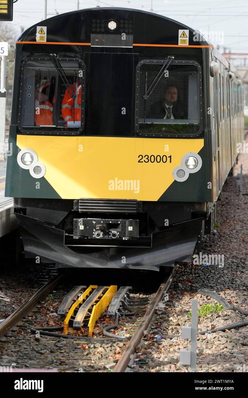 A fast charge battery powered trial train drives into its charging ...