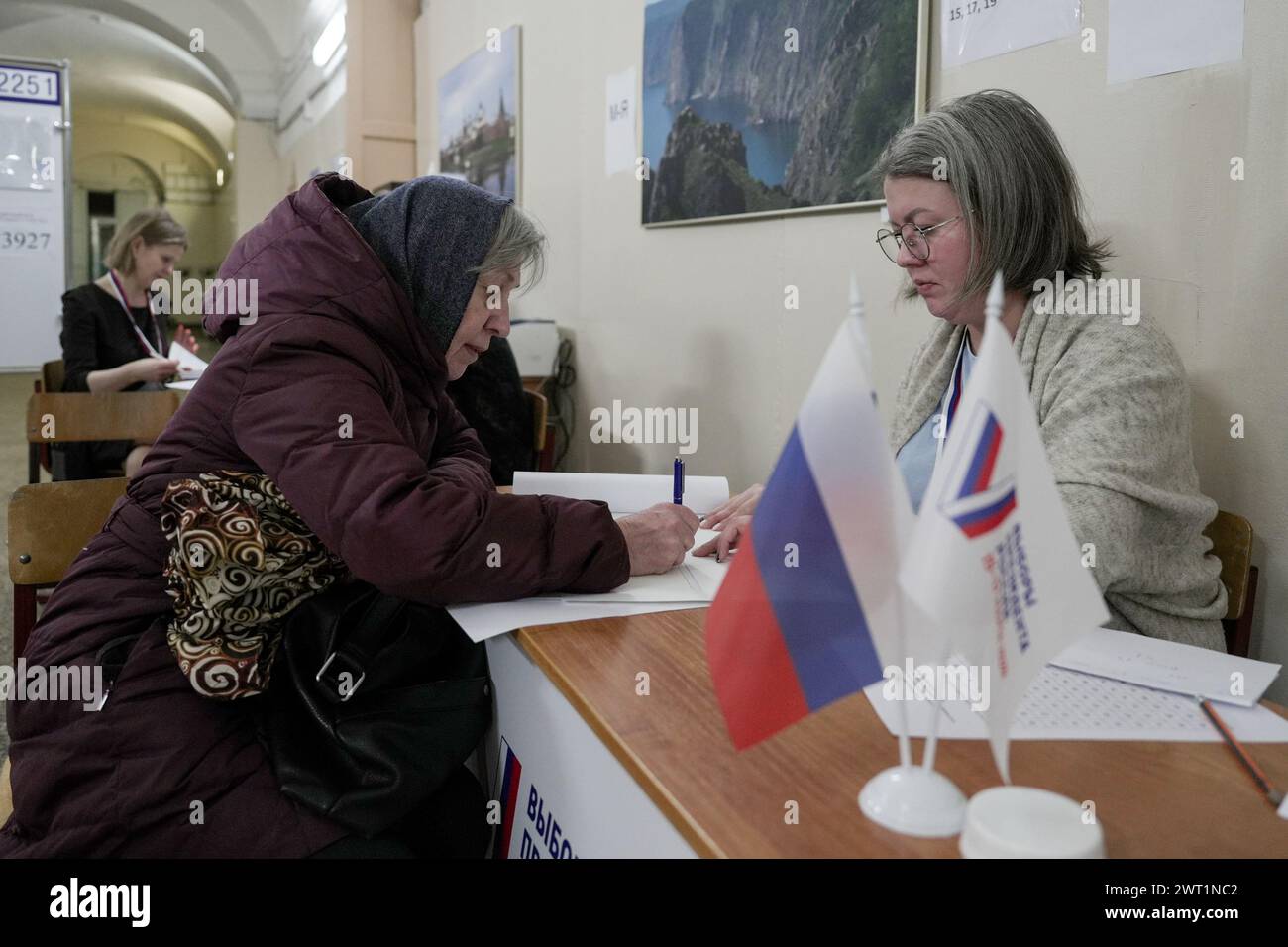 St.Petersburg, Russia. 15th Mar, 2024. A voter registers to vote at a ...