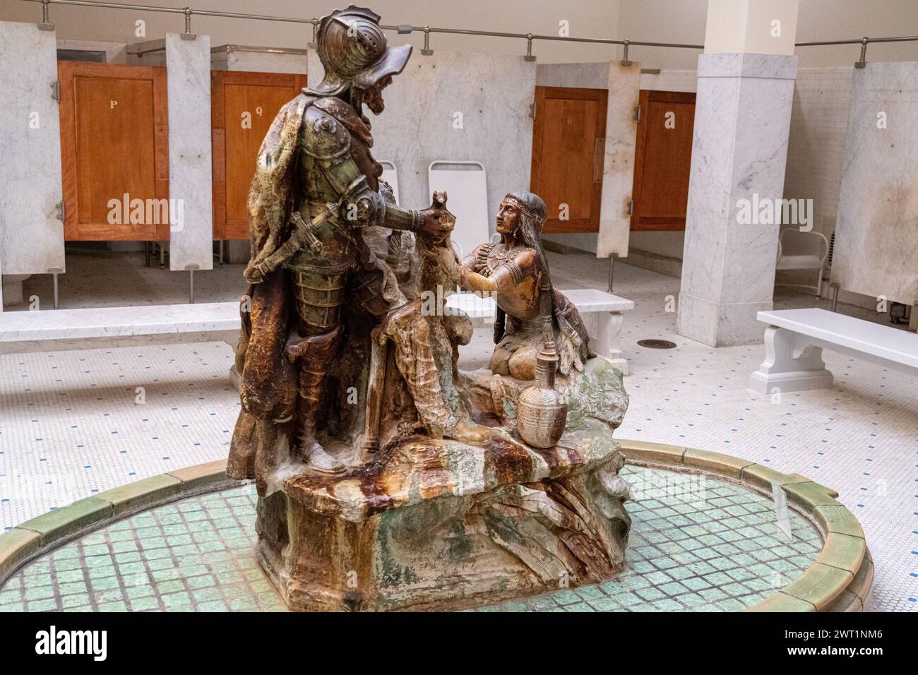 Statues on display inside a building Stock Photo - Alamy