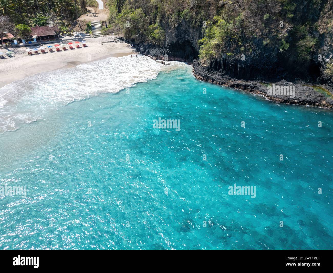 Bay with hotel complex, sea, beach and boats in Bali, drone photo Stock ...