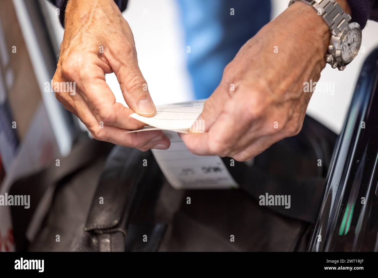 Duesseldorf, Germany. 15th Mar, 2024. Passengers can print out their ...