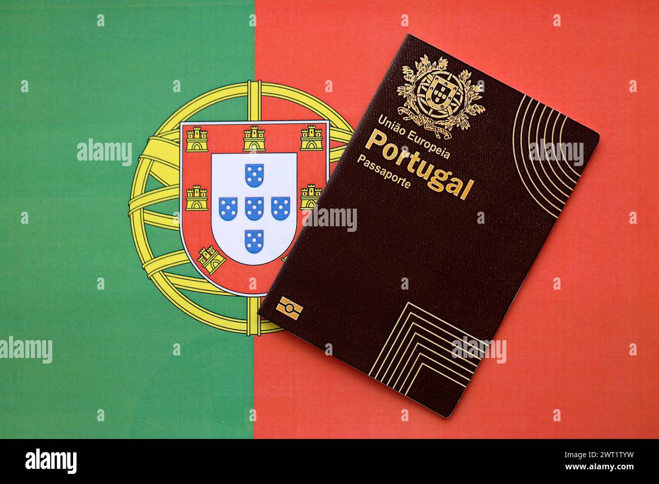 Red Portugal passport of European Union on national flag background ...