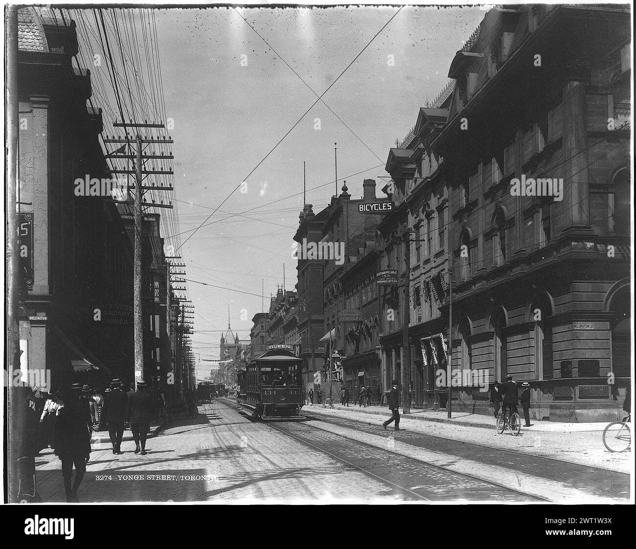 Vintage Street Photography of downtown Toronto. Street car going down ...