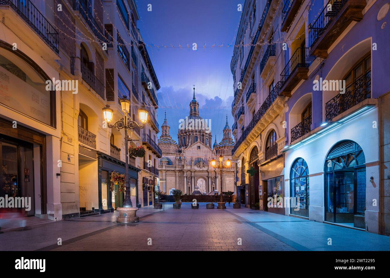 Street view of the city of Zaragoza, Spain. The building at the end of ...