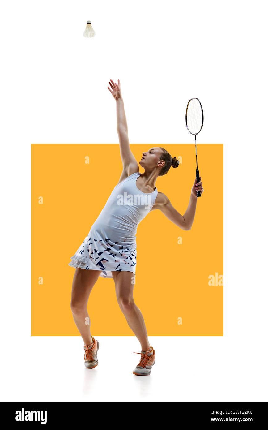 Sportive young girl, badminton player in motion serving shuttlecock ...