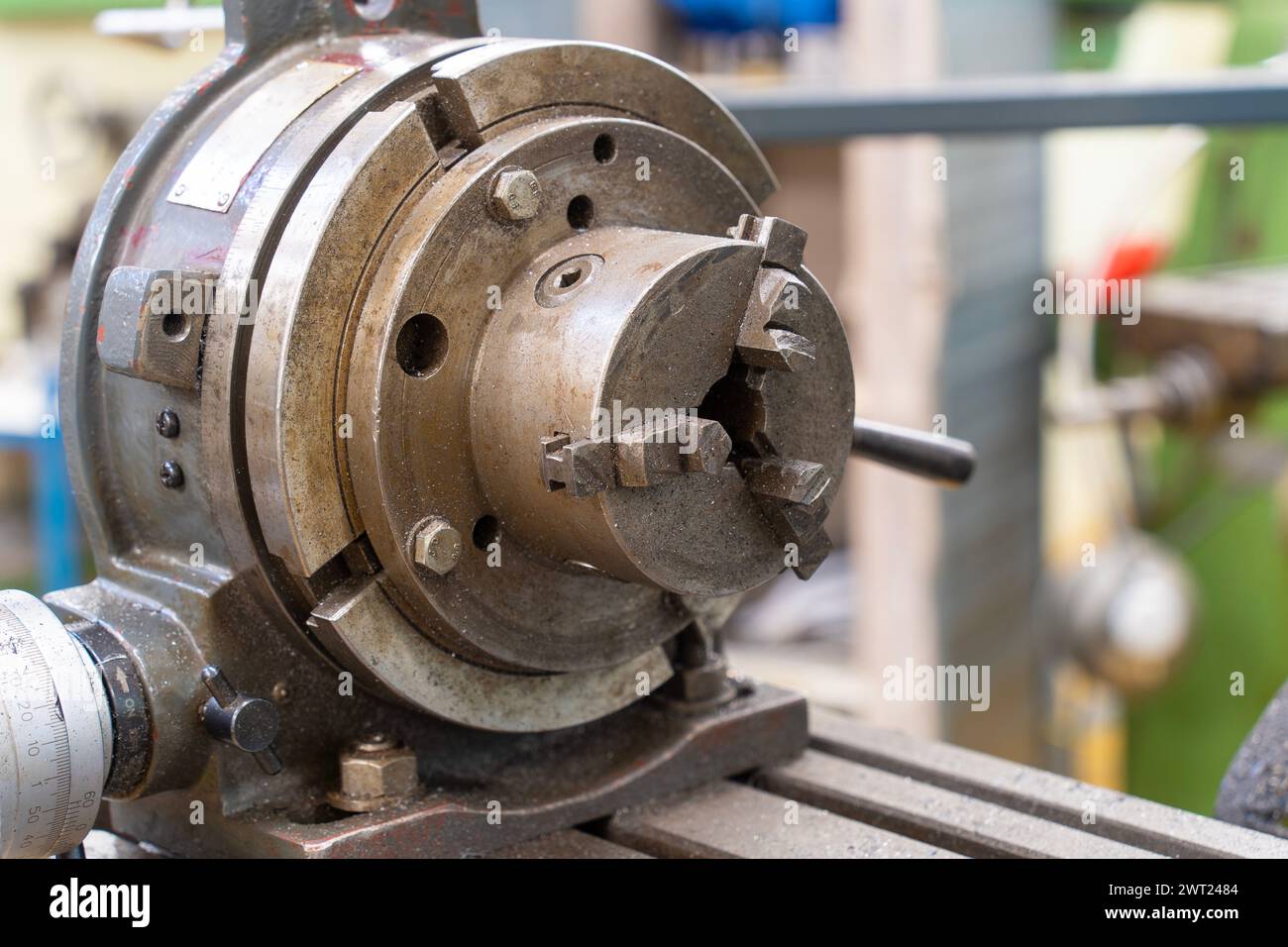 A metal disc part of a metalworking milling machine in a workshop Stock ...