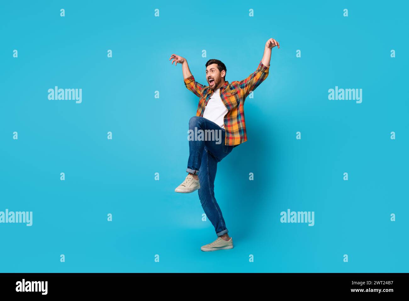 Full body photo of attractive young man fighter crane pose wear trendy ...