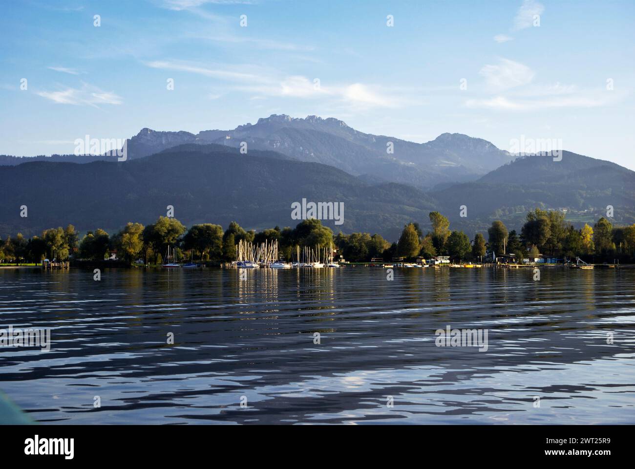 Sailboats are anchored in harbor at Chiemseepark Felden, Bernau am ...