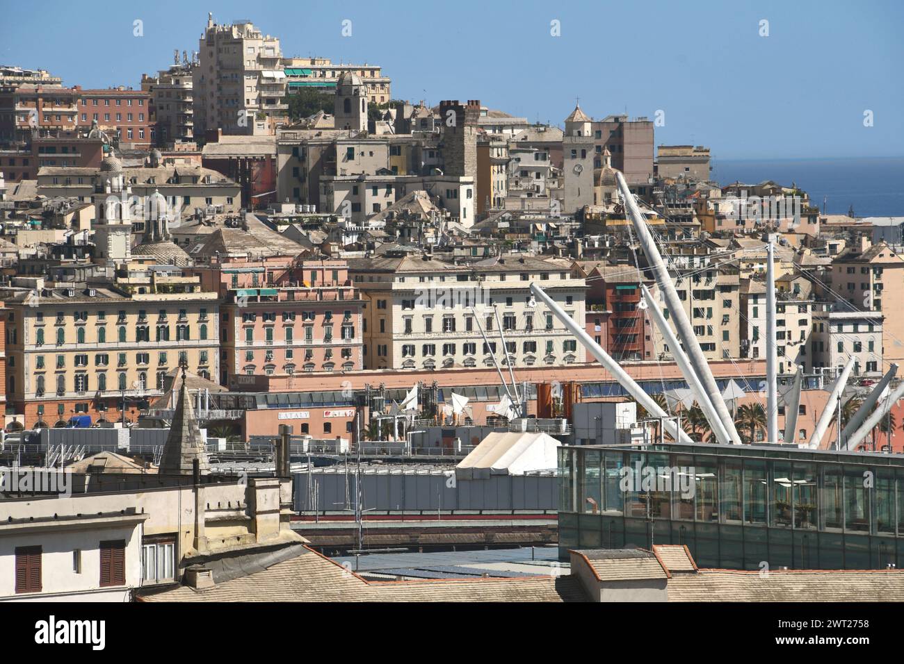 The port of Genoa is a place of great charm with large ships ...
