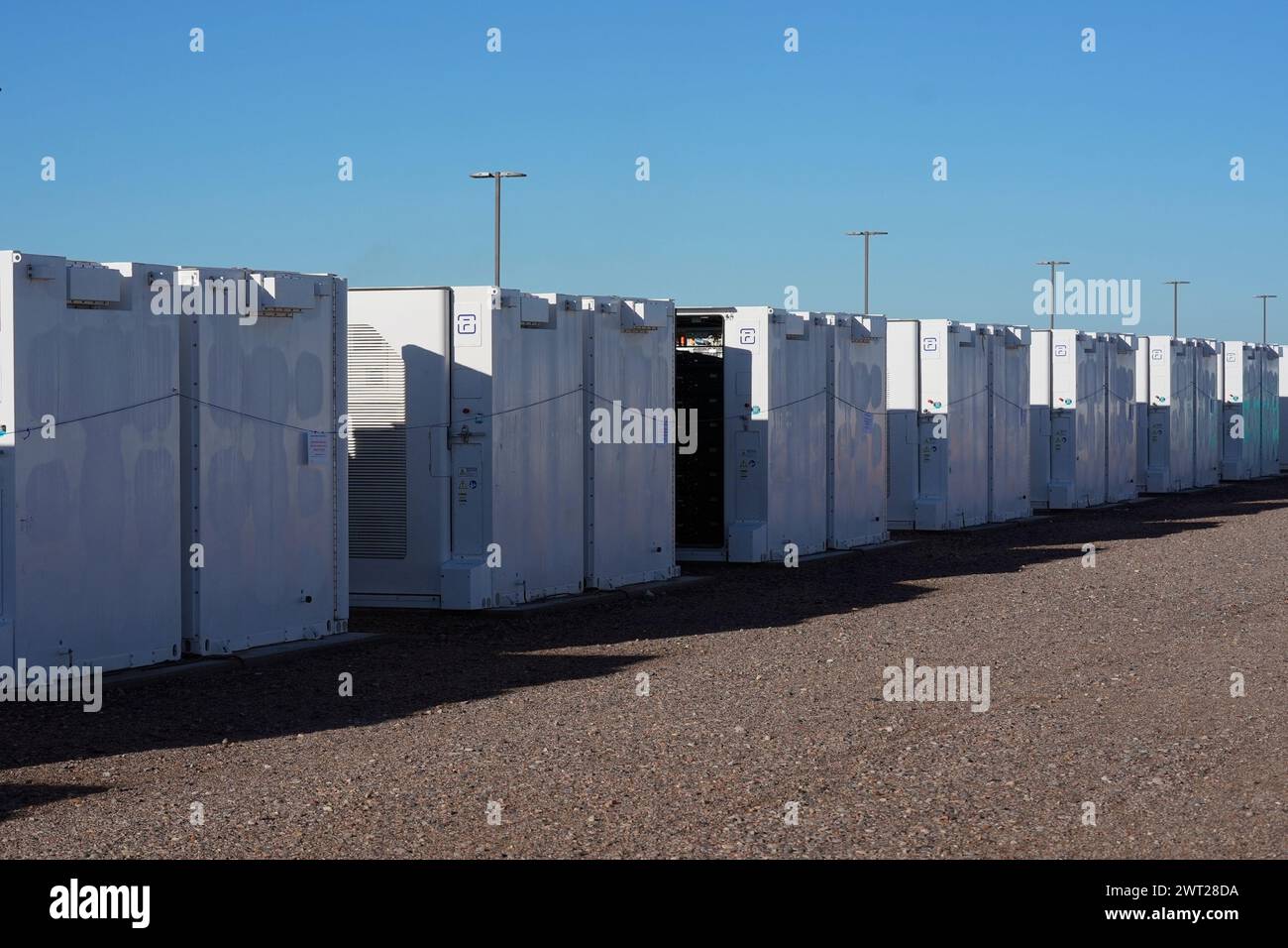 Rows of battery storage pods at Orsted's Eleven Mile Solar Center ...