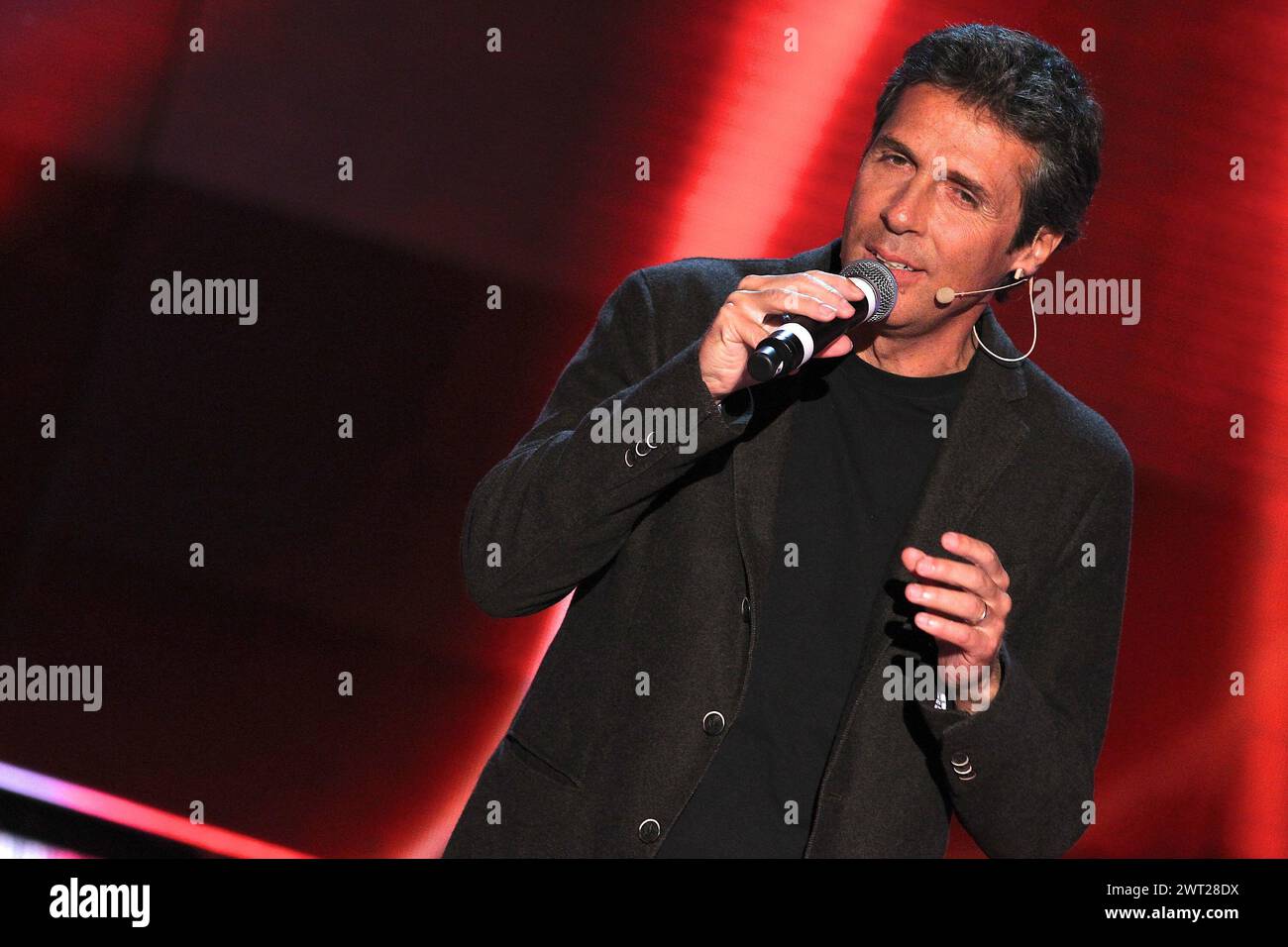 Luca Barbarossa performs live at the RAI studios in Naples Stock Photo ...