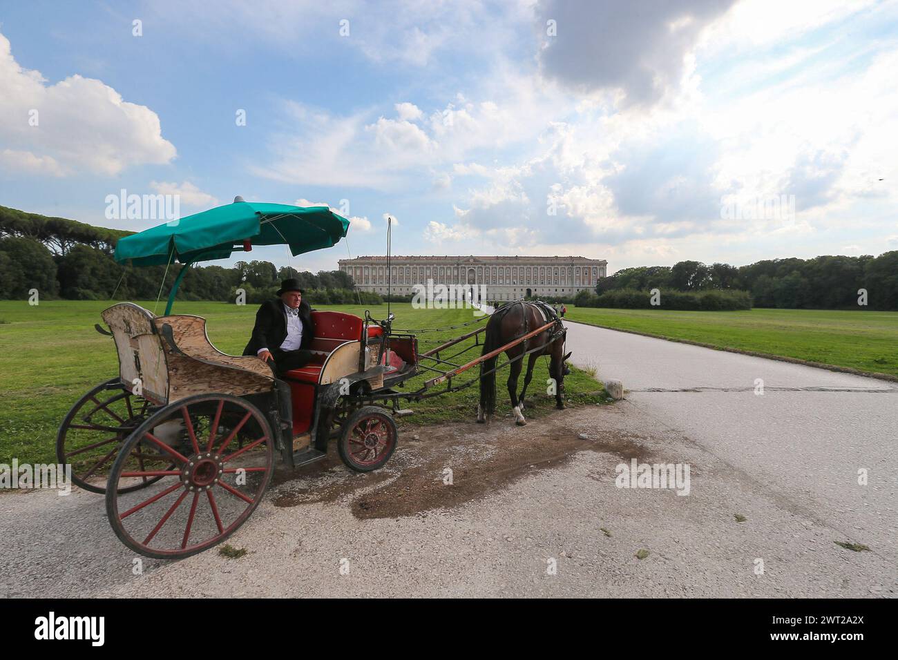 The main avenue, with the garden and a typical calesse, of the Royal ...