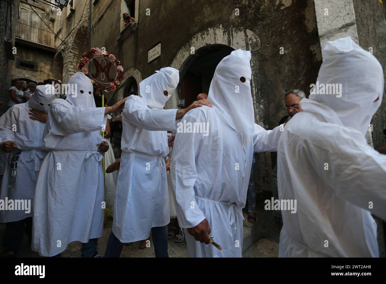 Hooded men, called "battenti", during the seven-year rituals in honor ...
