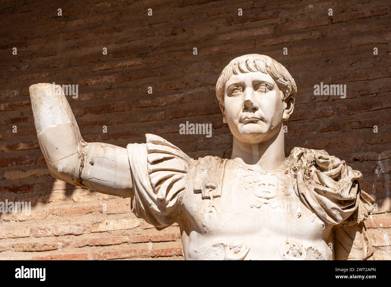 Close-up on face of statue in ruins portraiting an ancient roman ...