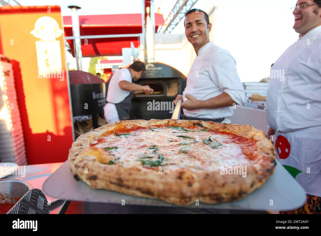 The pizza master, Gino Sorbillo, prepares a pizza on the Caracciolo ...