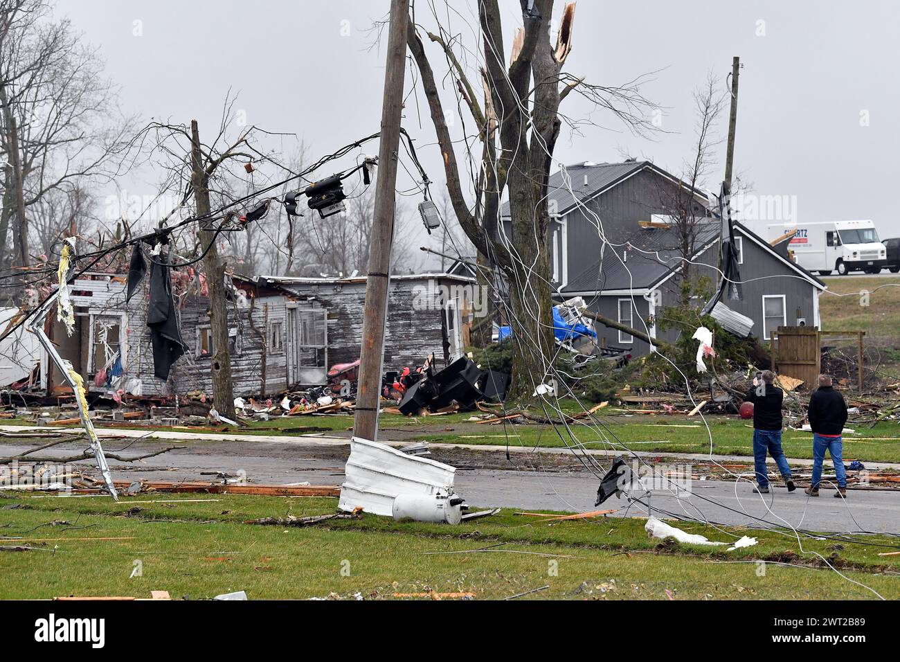 Town residents survey the damage following a severe storm in Lakeview ...