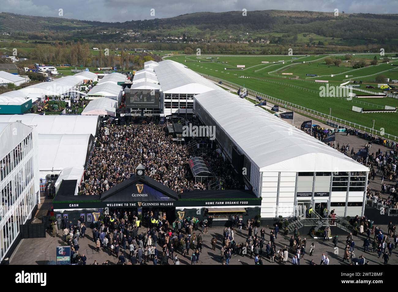 Racegoers at the Guinness Village on day four of the 2024 Cheltenham ...