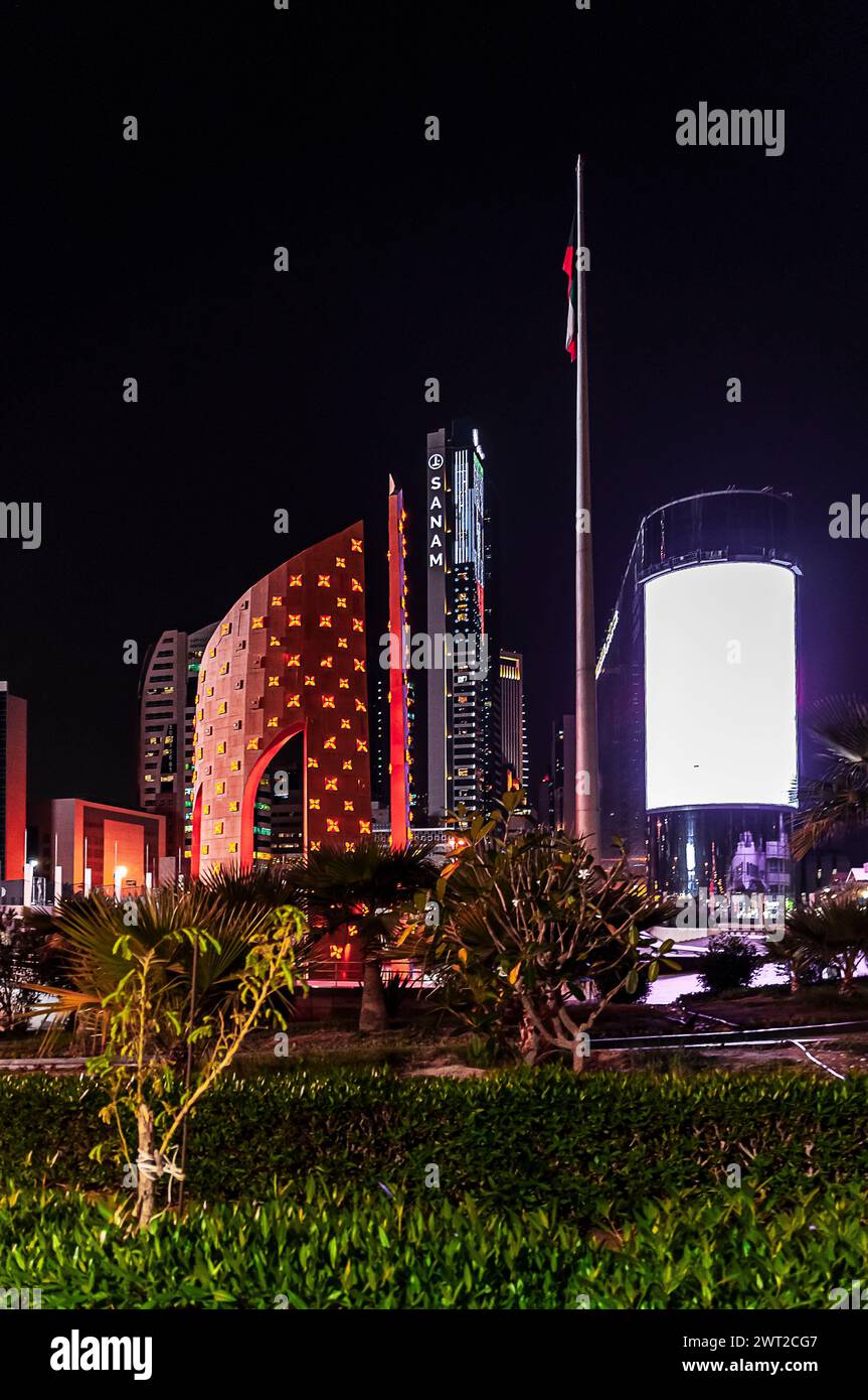 the colors of the buildings of Kuwait City at night Stock Photo - Alamy
